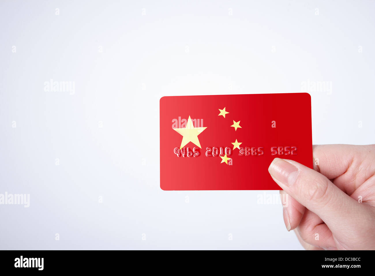 a person with traditional costume holding Chinese card Stock Photo - Alamy