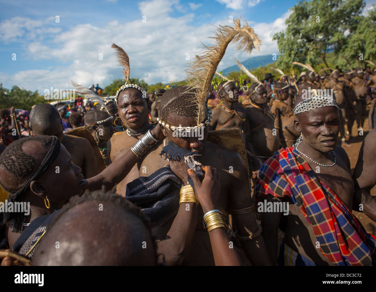 Bodi Tribe Woman Putting Water On The Face Of A Fat Man During Kael ...