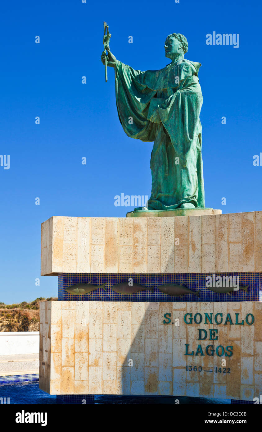 Statue of Sao Goncalo de Lagos protector of fishermen above Lagos ...