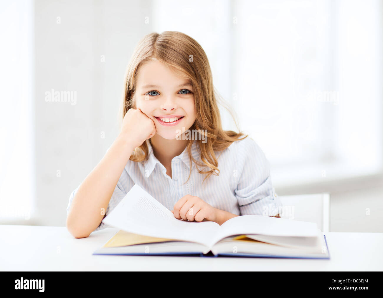 little student girl studying at school Stock Photo - Alamy