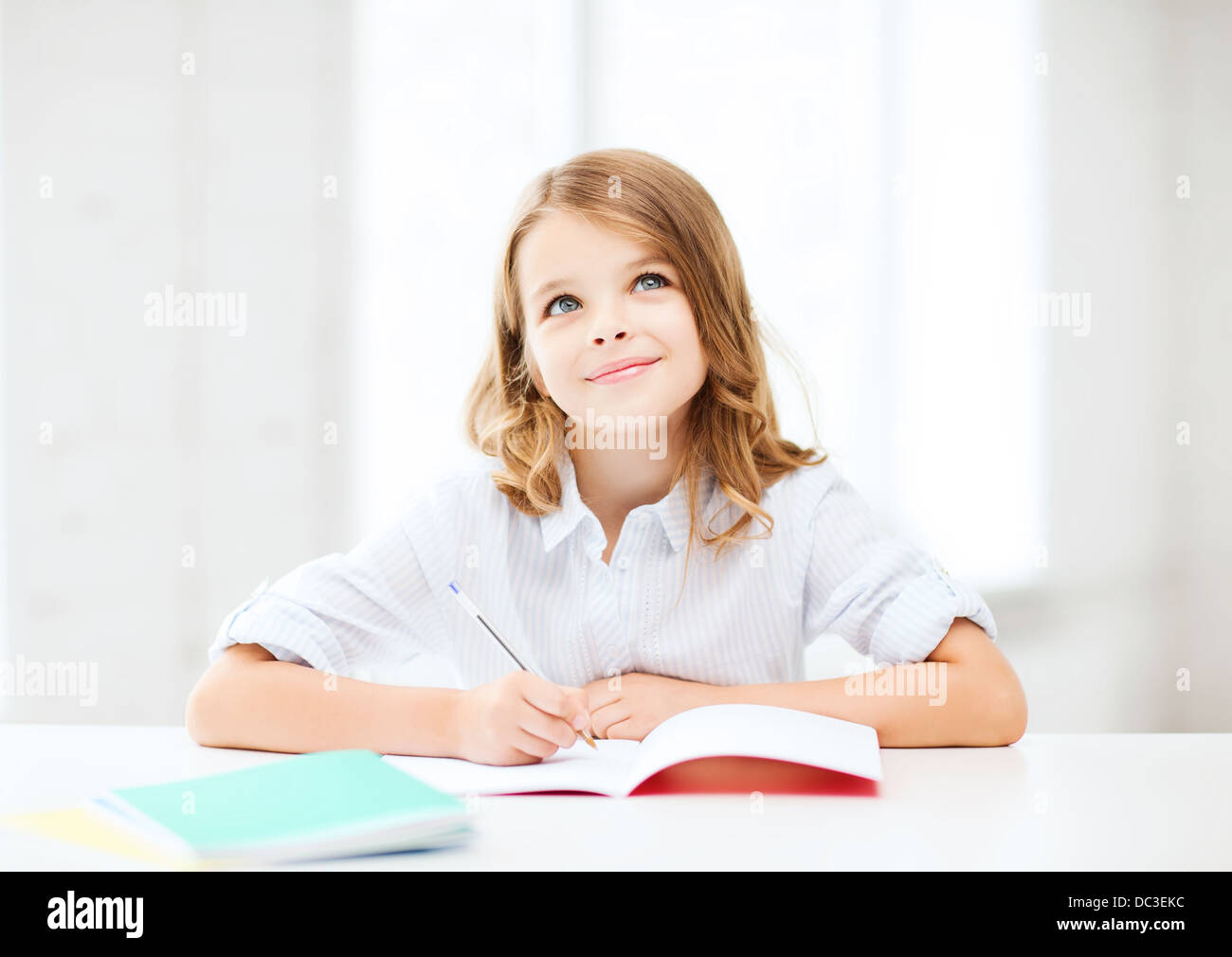 student girl studying at school Stock Photo - Alamy