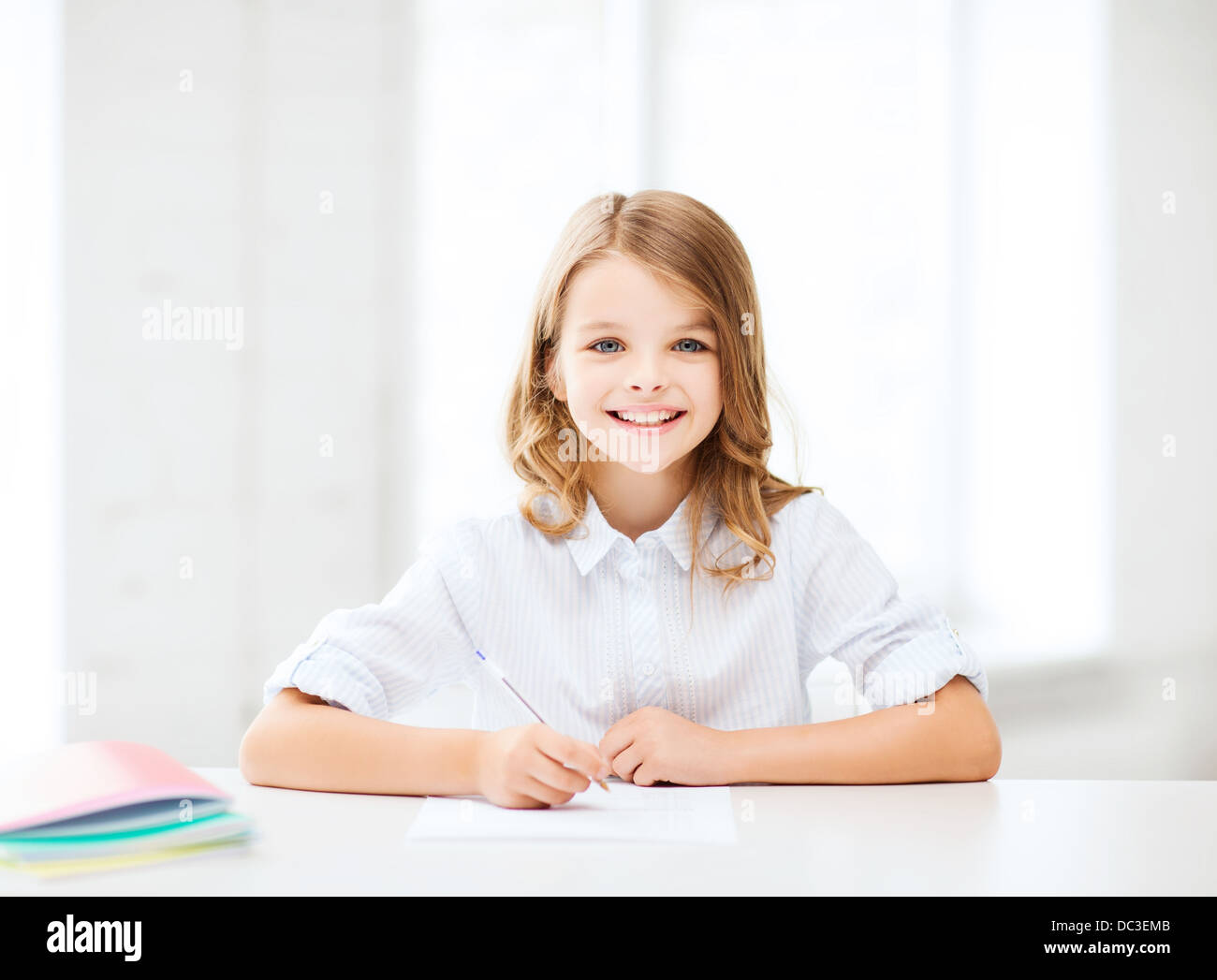 student girl studying at school Stock Photo - Alamy