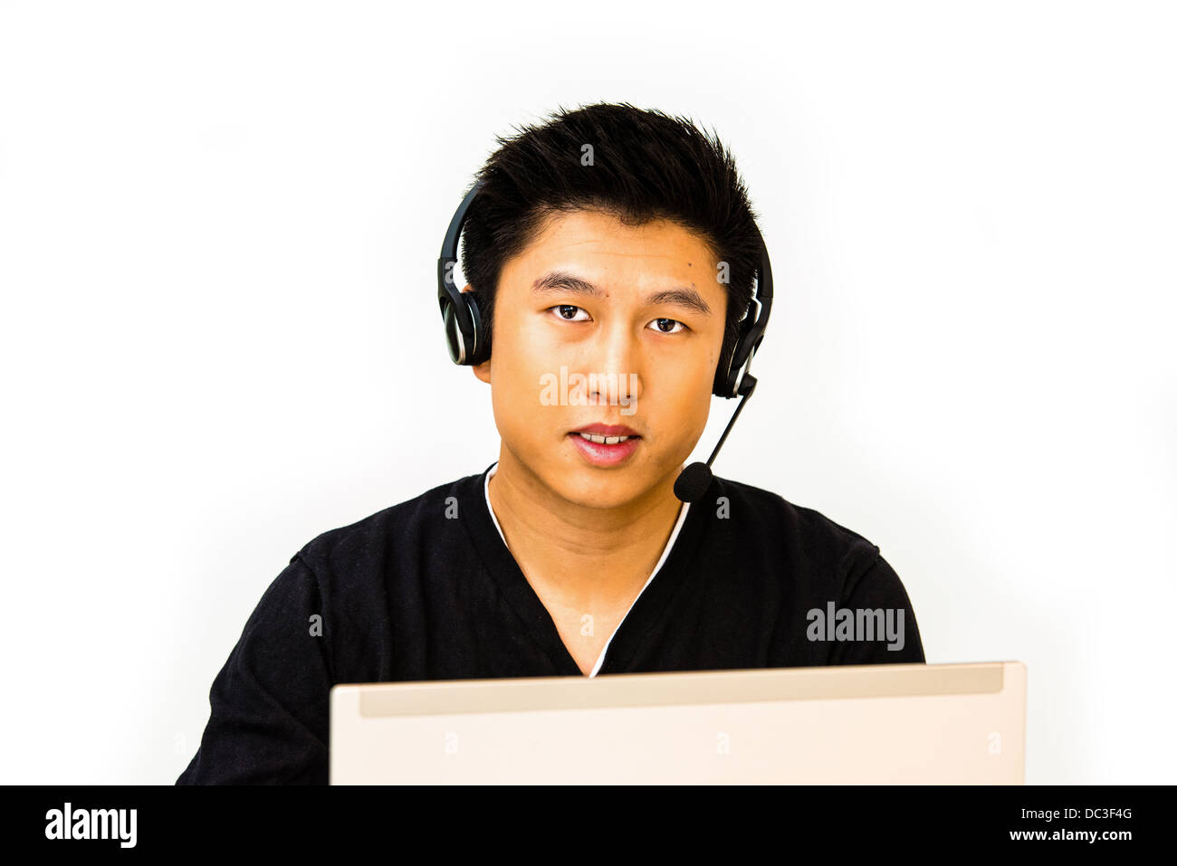 Customer Service Helpdesk Operator Talking To A Customer And Wearing A ...