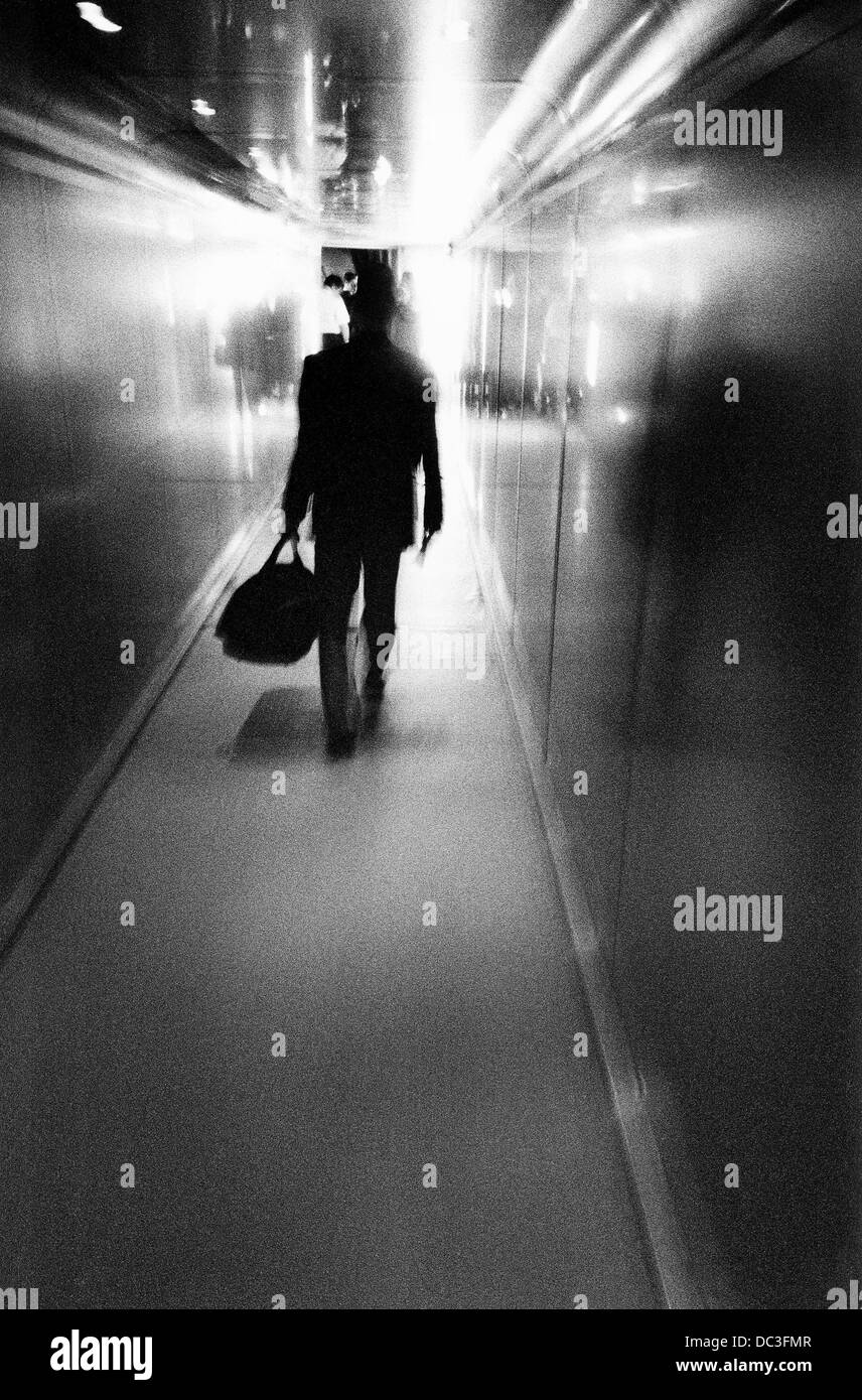 Man walk back view Black and White Stock Photos & Images - Alamy