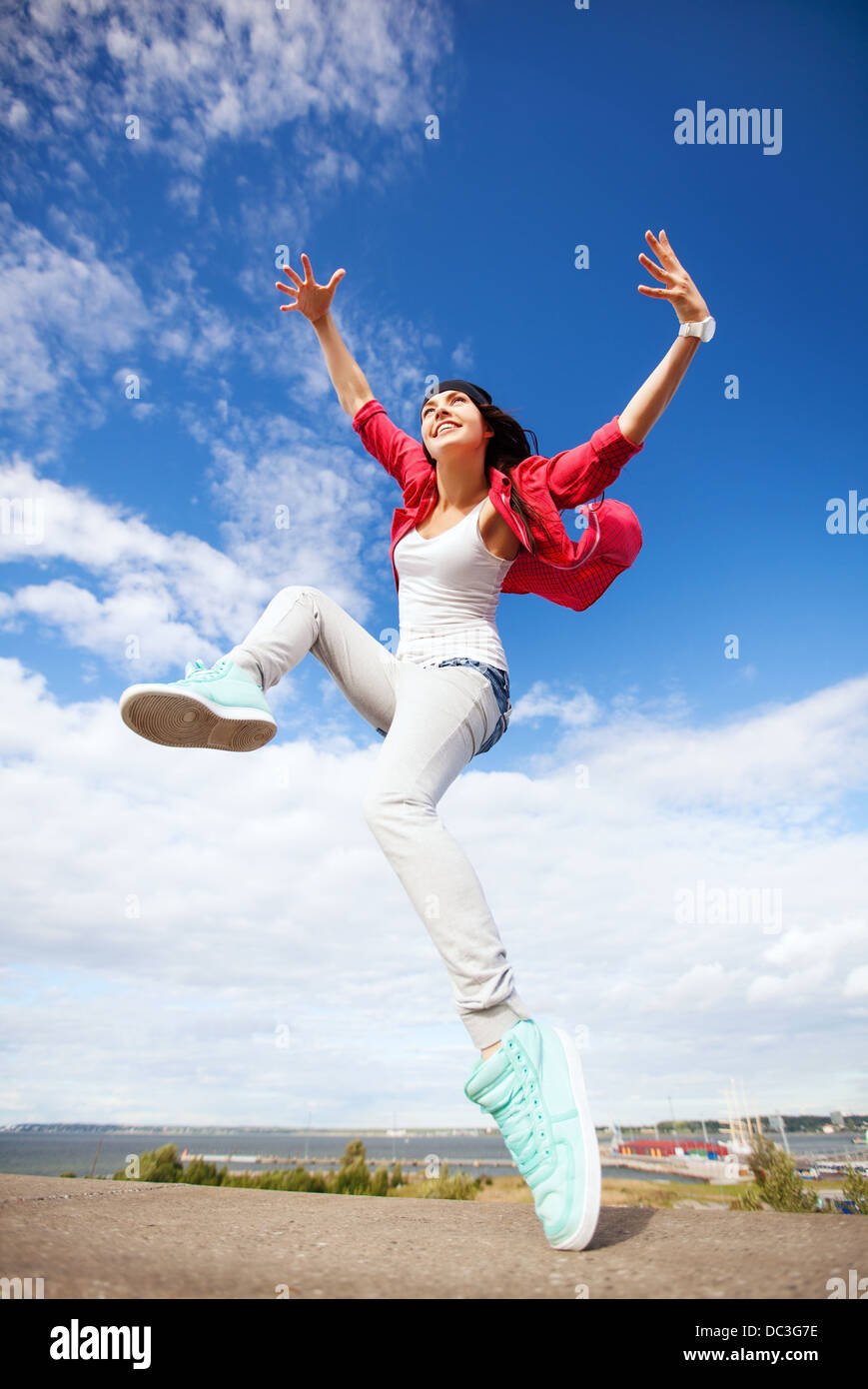 beautiful dancing girl jumping Stock Photo - Alamy