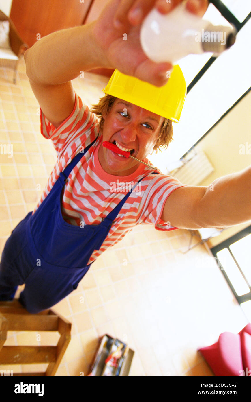 Installing a bulb Stock Photo - Alamy