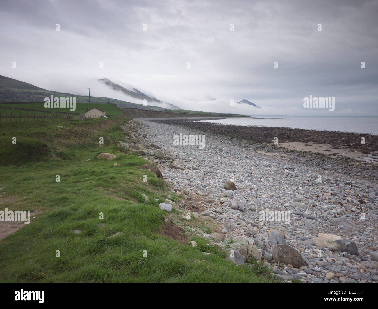 Irish sea low tide brooding sky hi-res stock photography and images - Alamy