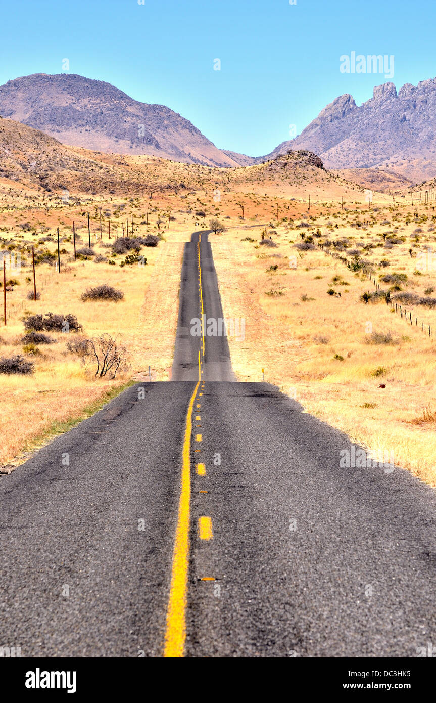 A long straight road crosses the Texan Prairie in Jeff Davis County ...