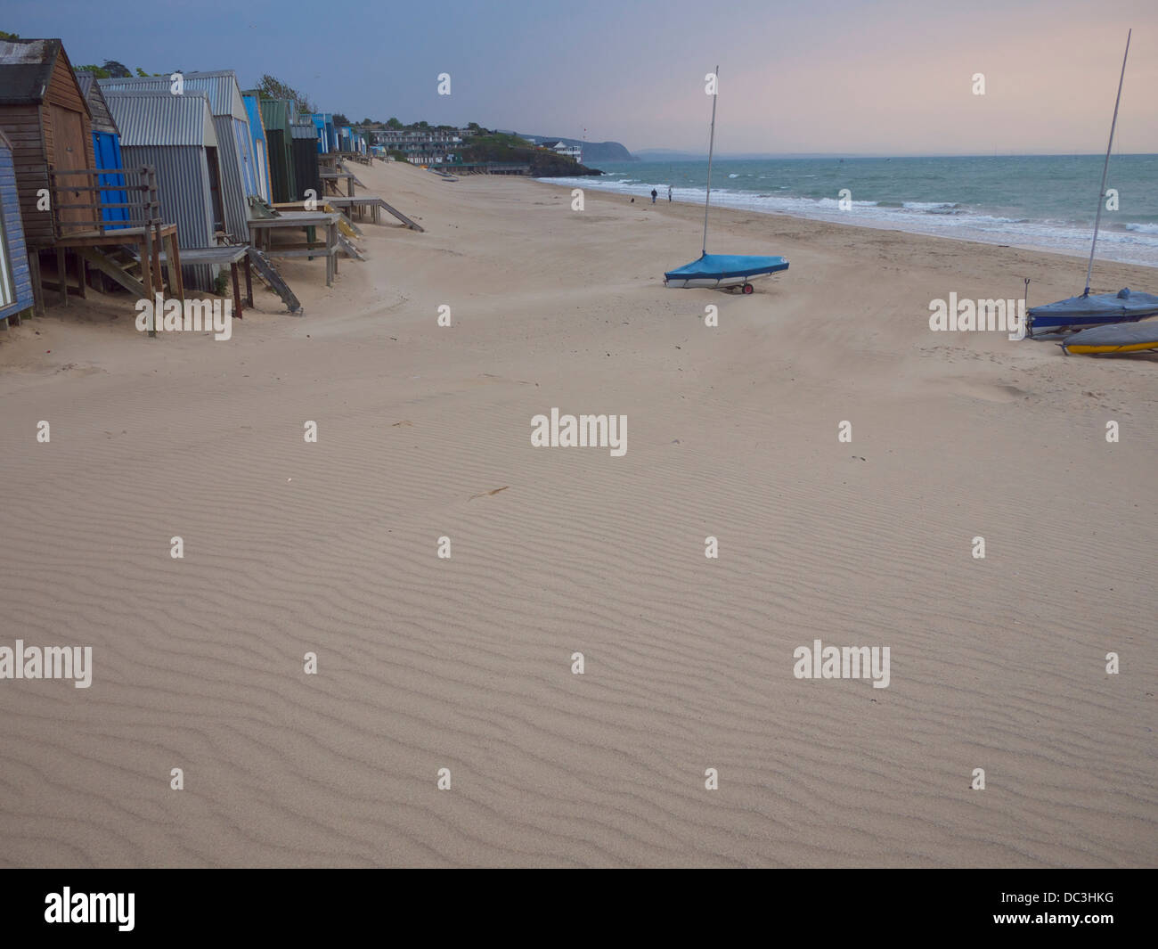 Beach huts and boats Stock Photo - Alamy