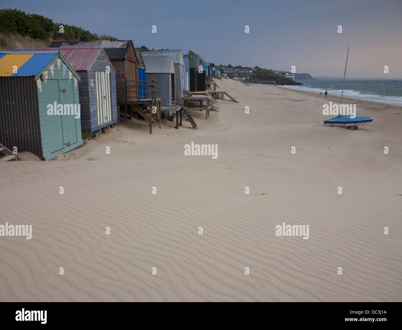 Beach huts and boats Stock Photo - Alamy
