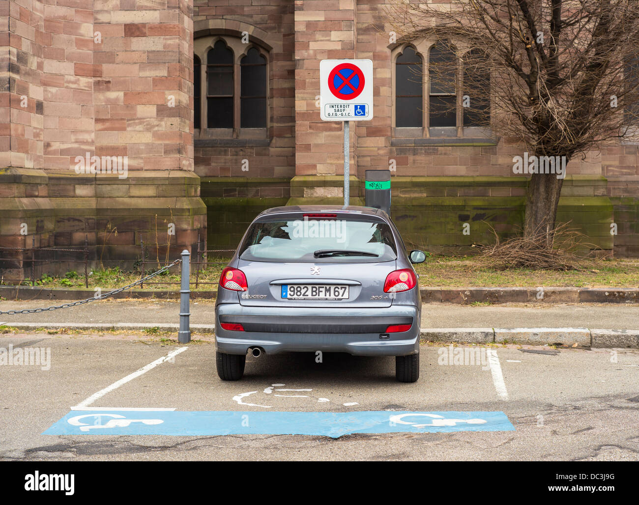 Disabled car parking bay painted hi-res stock photography and images ...