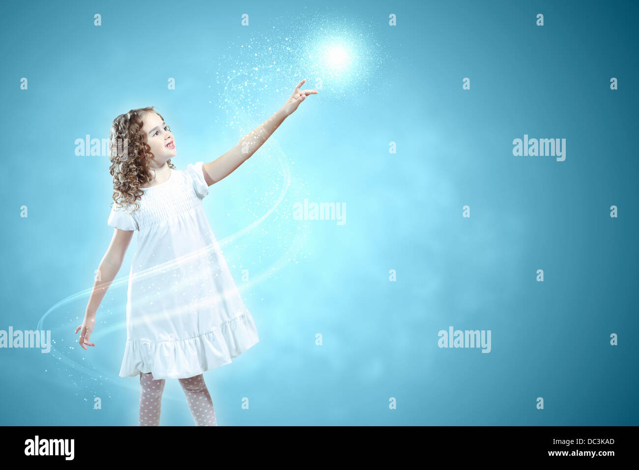 Child with magic light Stock Photo - Alamy