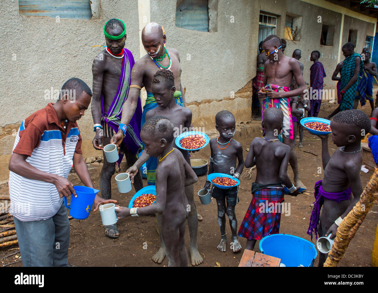 Mursi Tribe Kids Having Food In Their School, Mago Park, Omo Valley ...