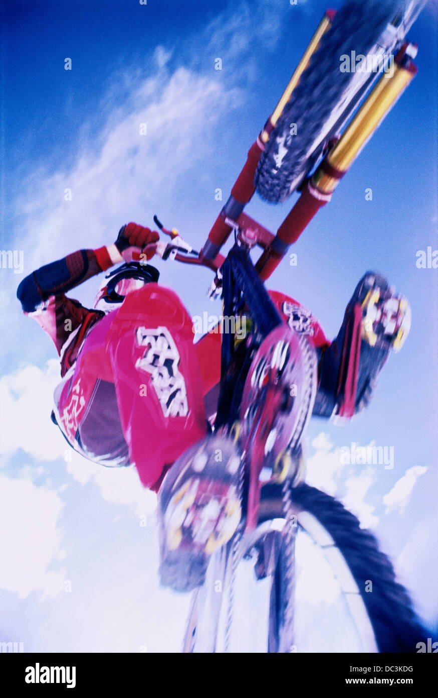 Mountain biker jumping over viewer Stock Photo - Alamy