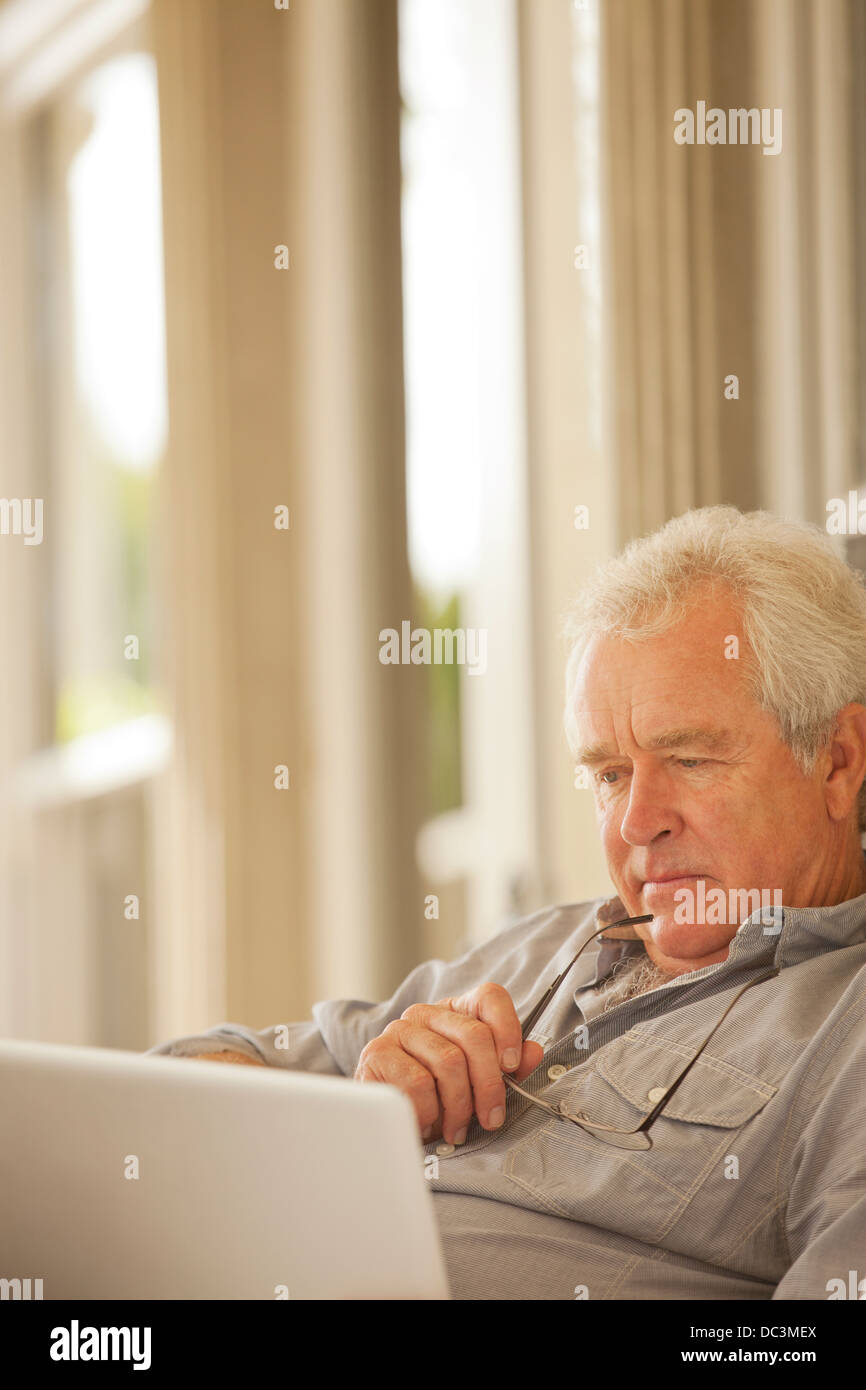 Serious elderly gentleman using hi-res stock photography and images - Alamy