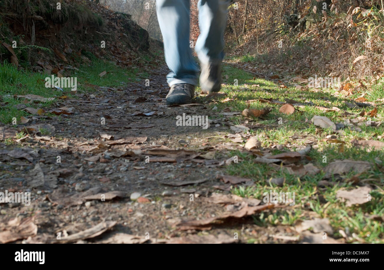 Walking on the footpath Stock Photo - Alamy