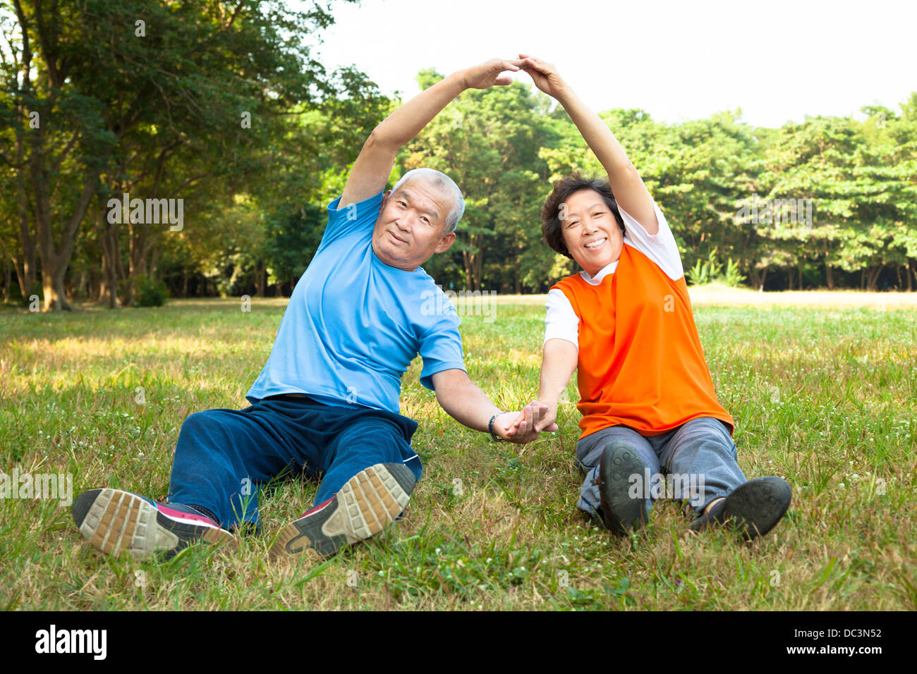 happy Senior couple do physical training in the park Stock Photo - Alamy