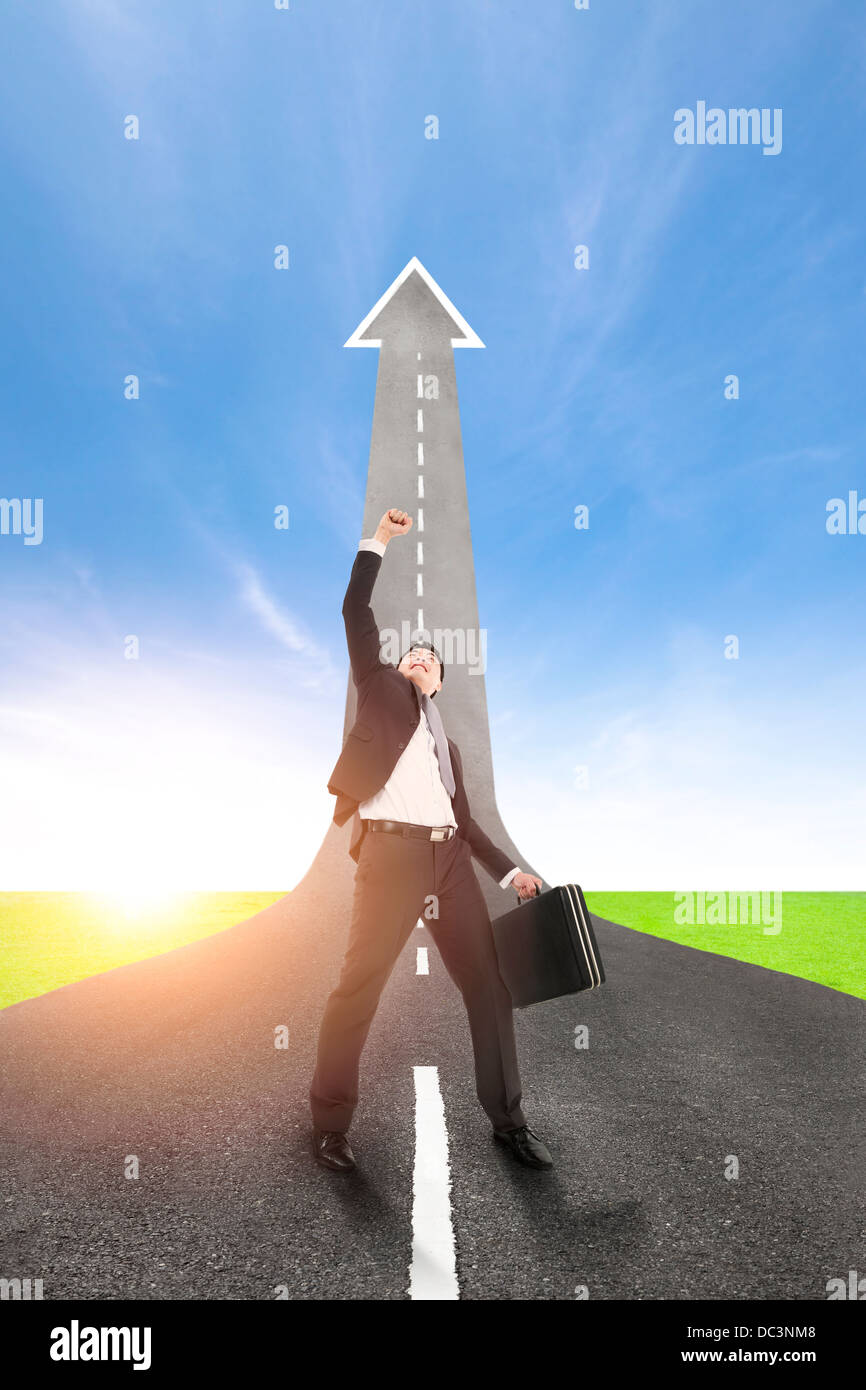 success businessman with the road rising up background Stock Photo - Alamy
