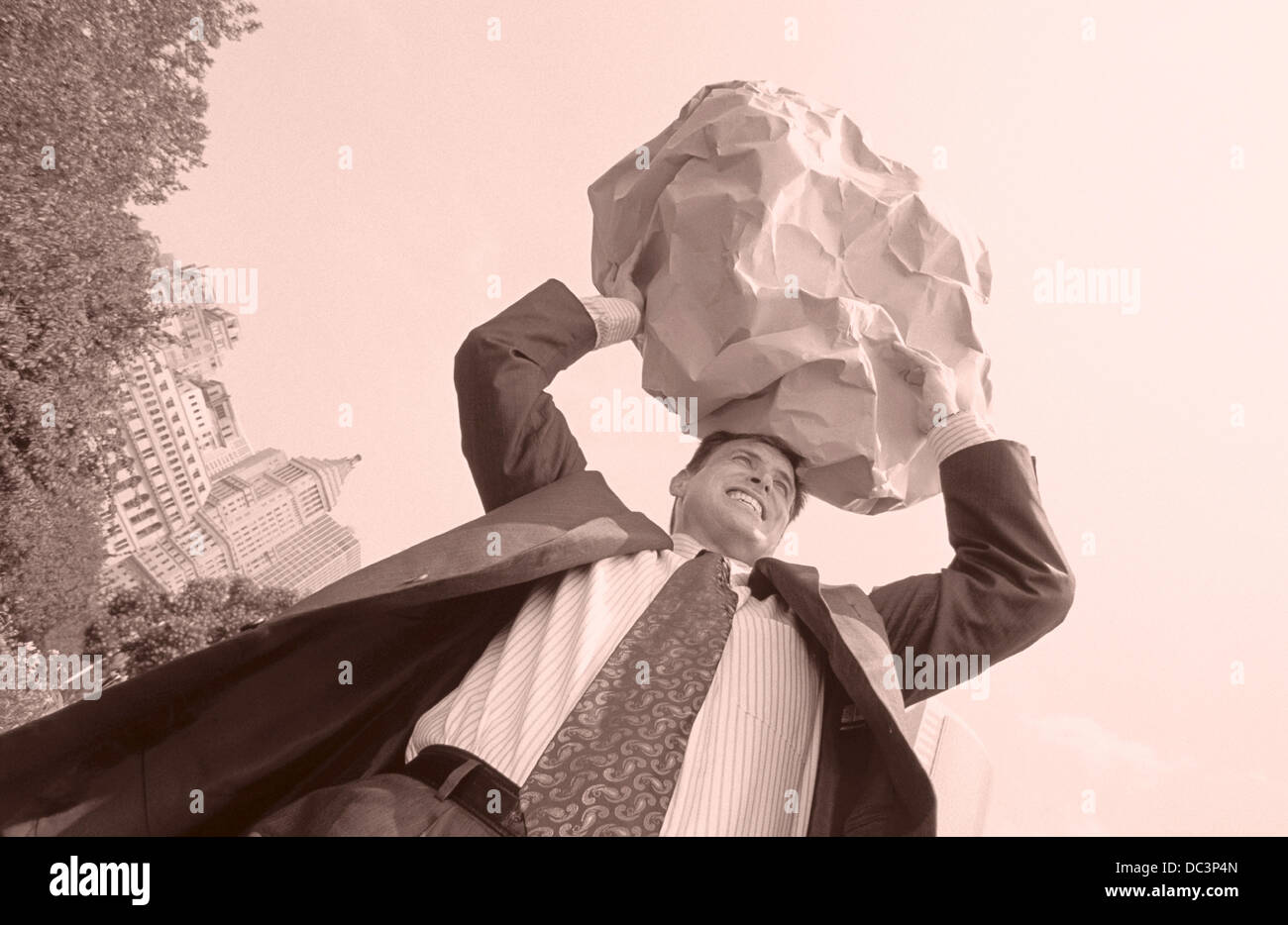 Businessman lifting rock hi-res stock photography and images - Alamy