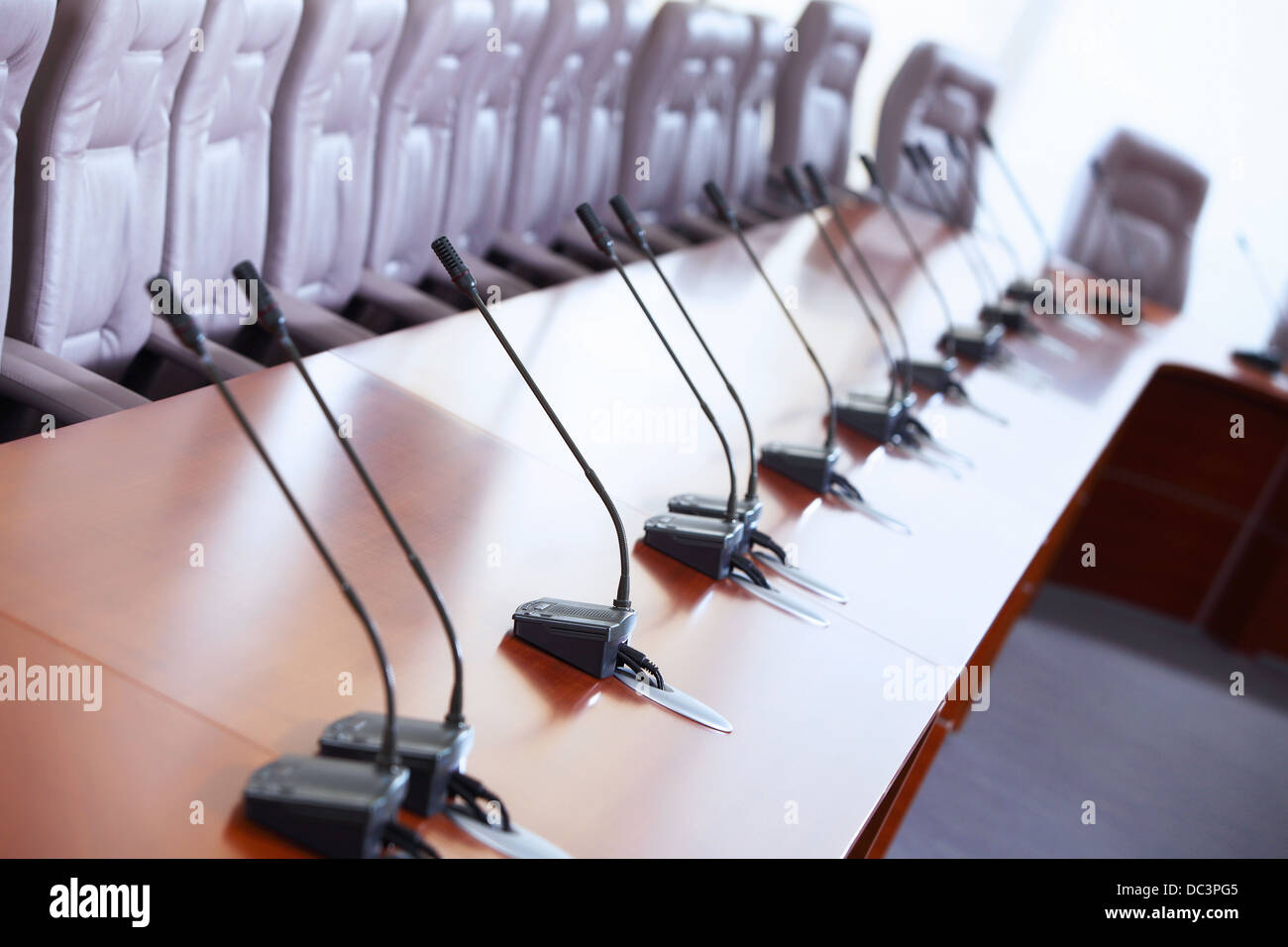 Conference hall with microphones Stock Photo - Alamy