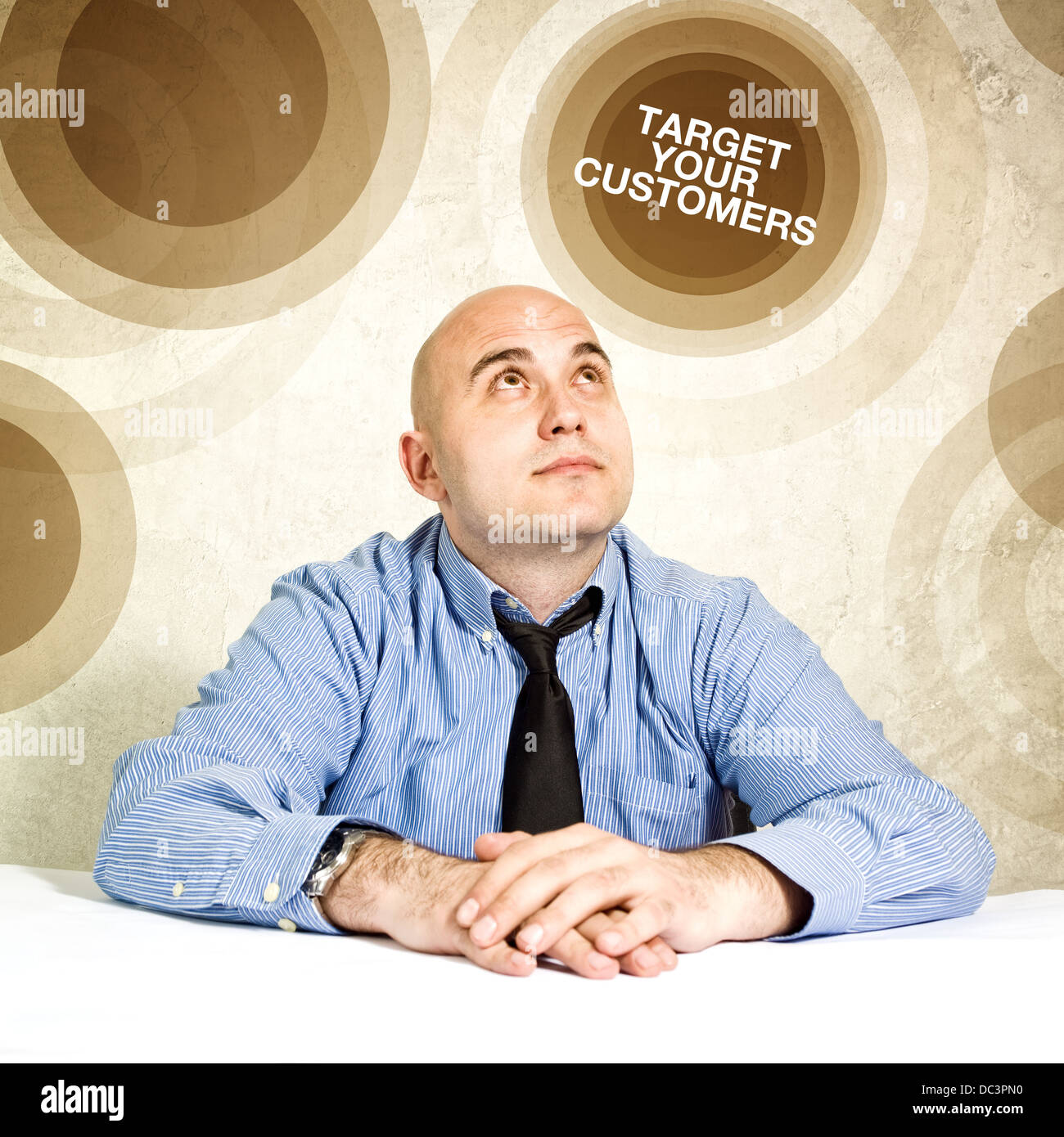 Target your customers; business concept. Businessman looking up Stock ...