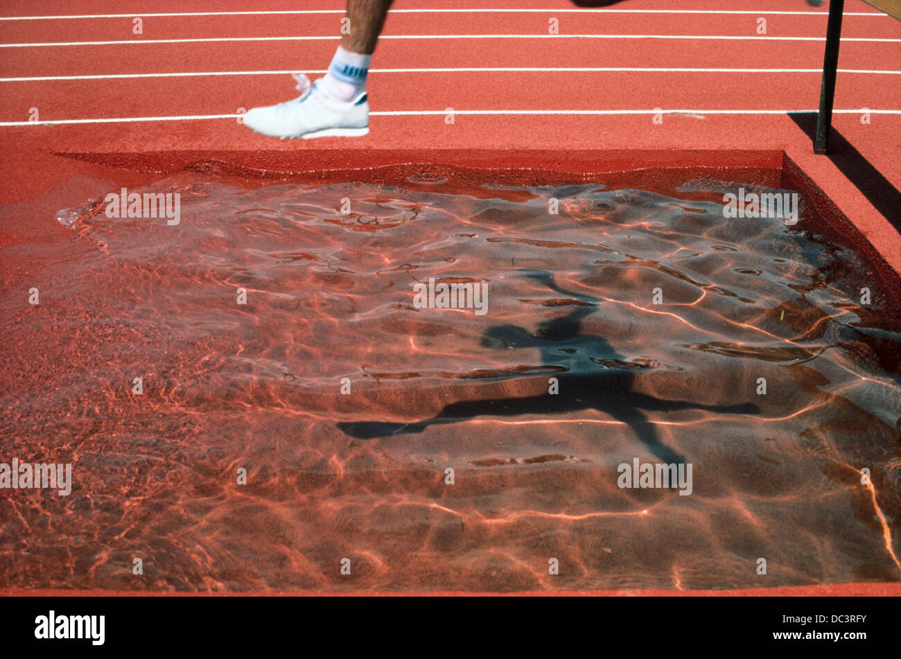 Adult leaping over water hi-res stock photography and images - Alamy