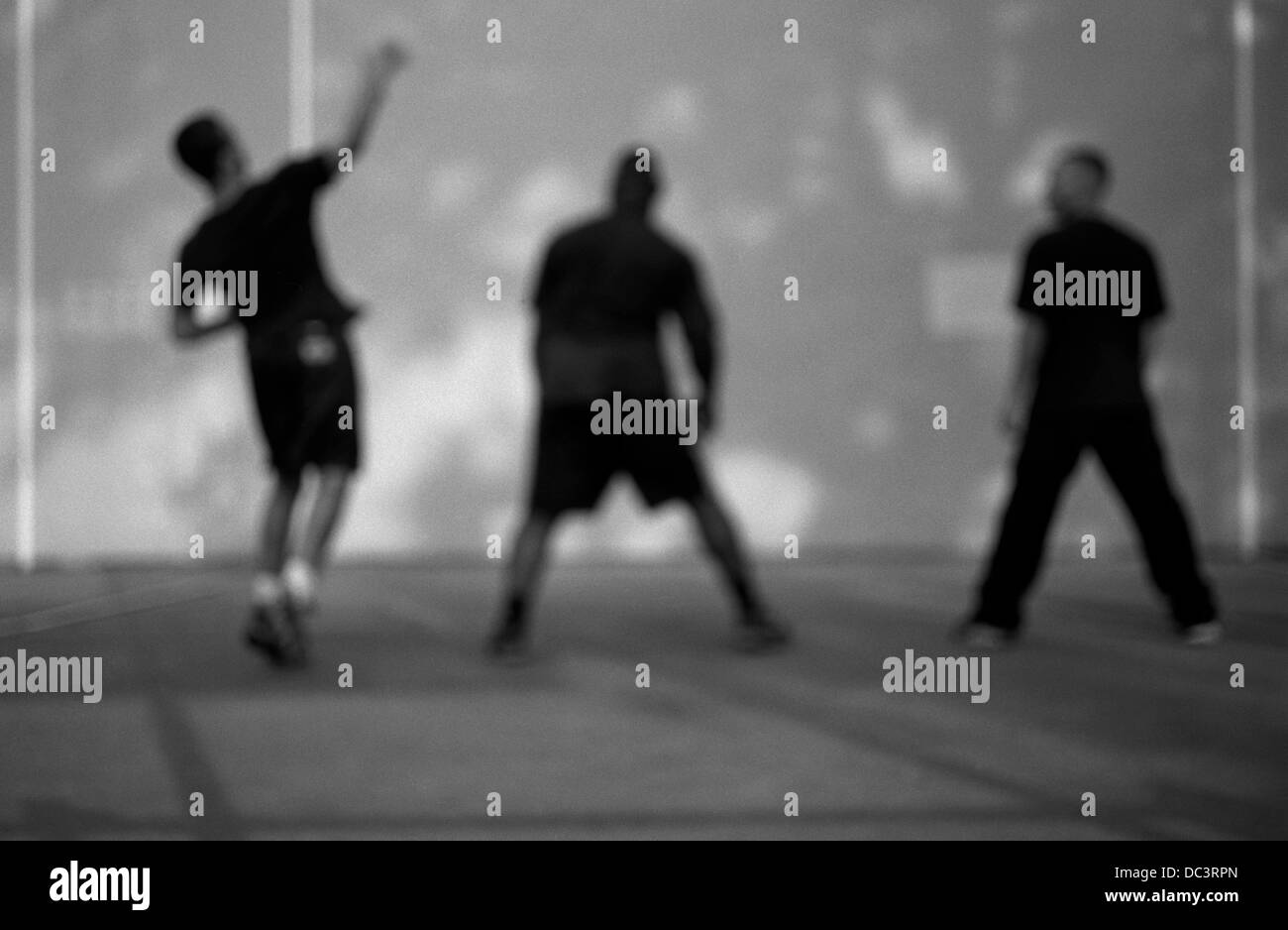 Three men play handball Stock Photo - Alamy