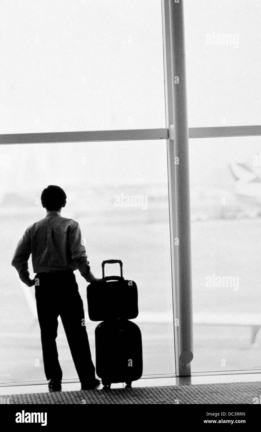 Man standing rear view Black and White Stock Photos & Images - Alamy