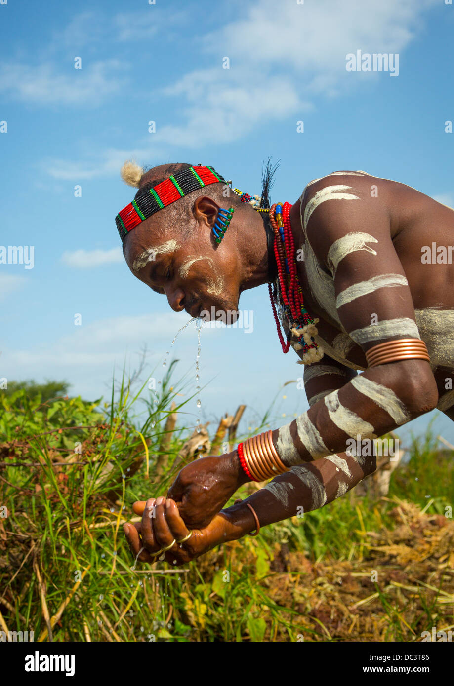Bashada Tribe Man Making Body Painting, Dimeka, Omo Valley, Ethiopia ...