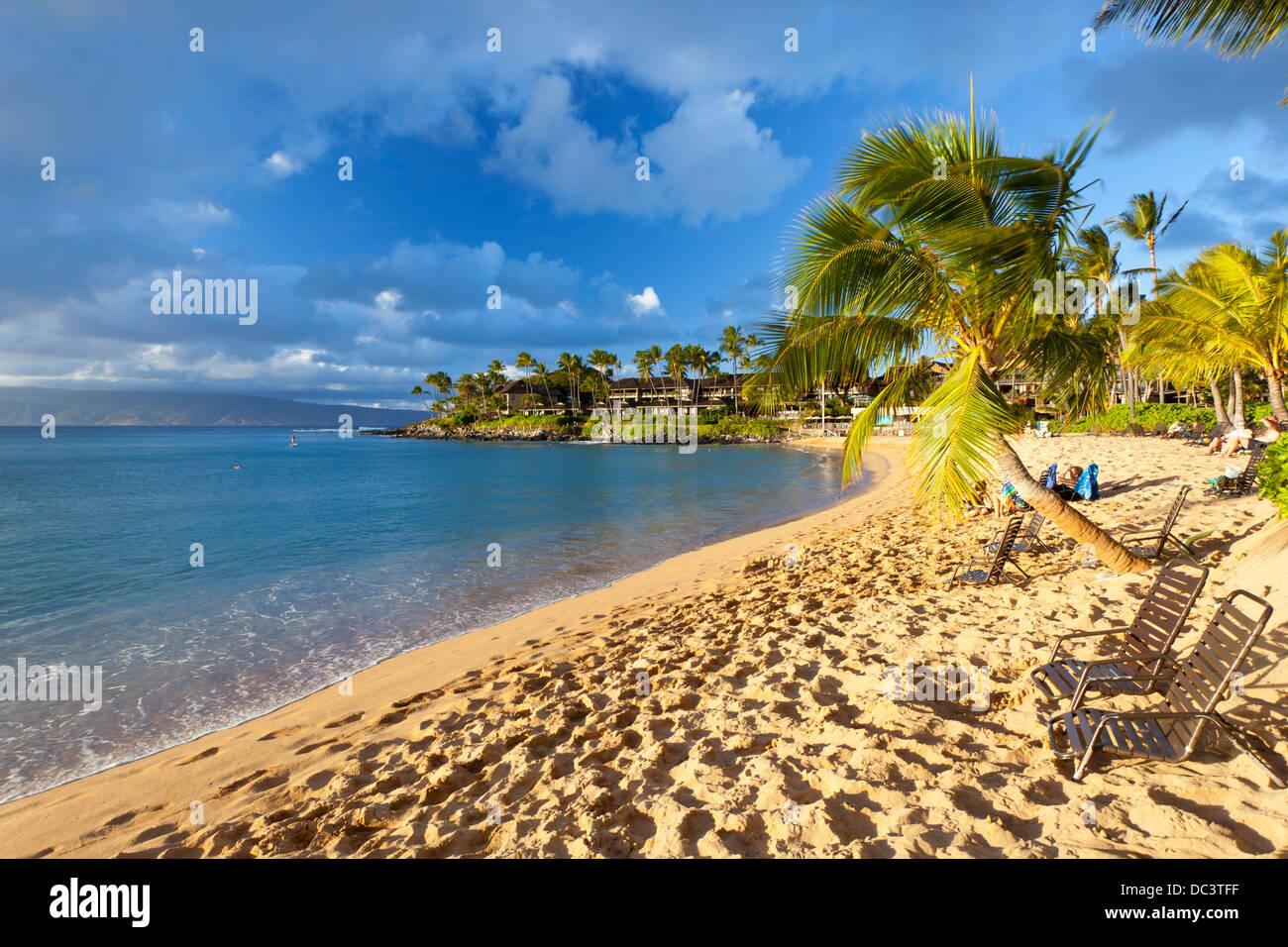 Napili Bay Beach in the evening in Maui, Hawaii with some tourists ...