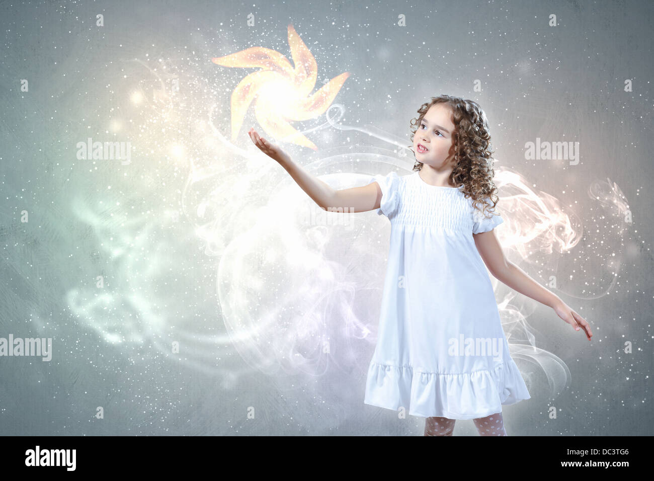 Child with magic light Stock Photo - Alamy