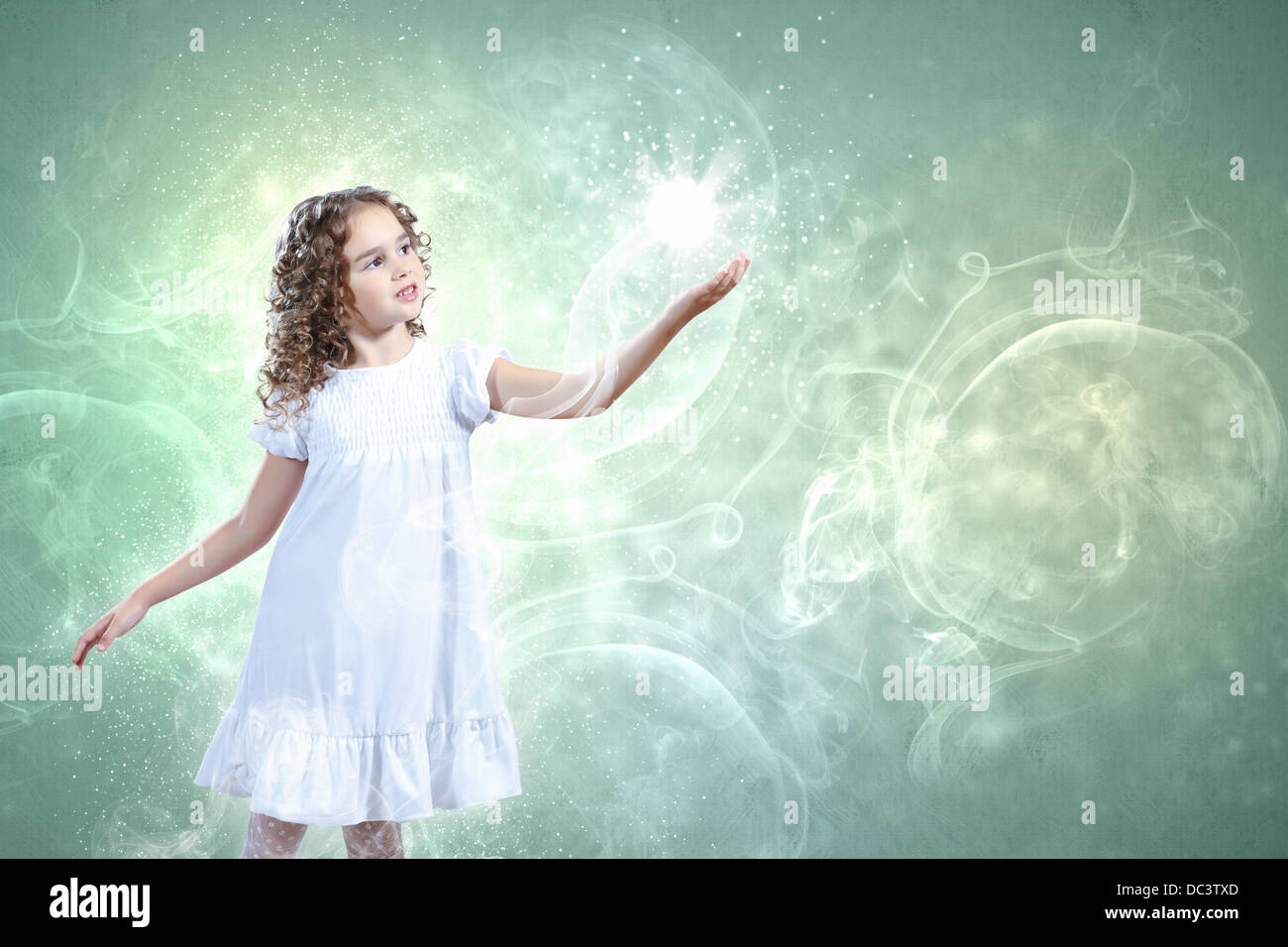 Child with magic light Stock Photo - Alamy