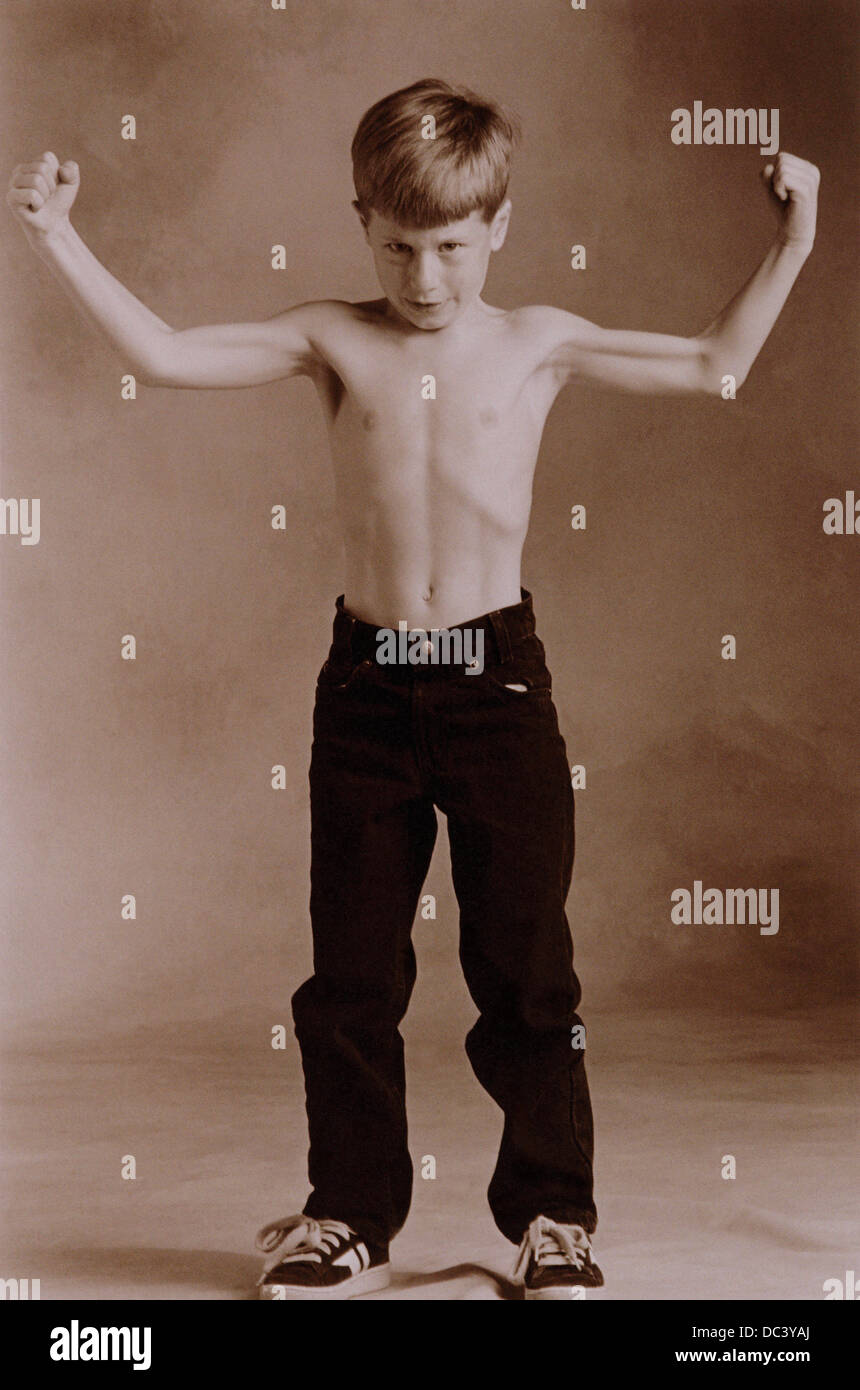 Boy making muscles hi-res stock photography and images - Alamy