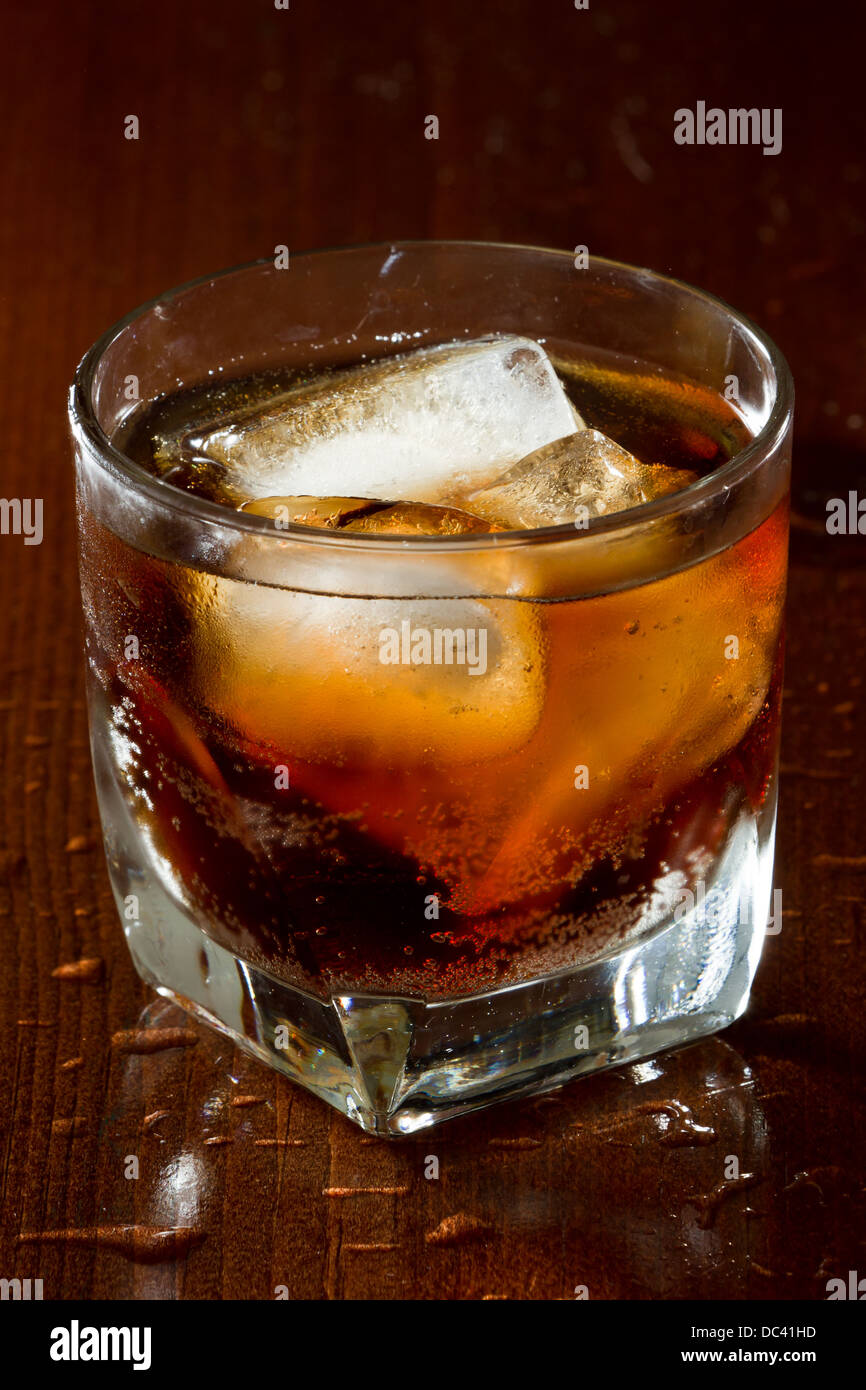 cuba libre, rum and cola cocktail served in a short glass Stock Photo ...