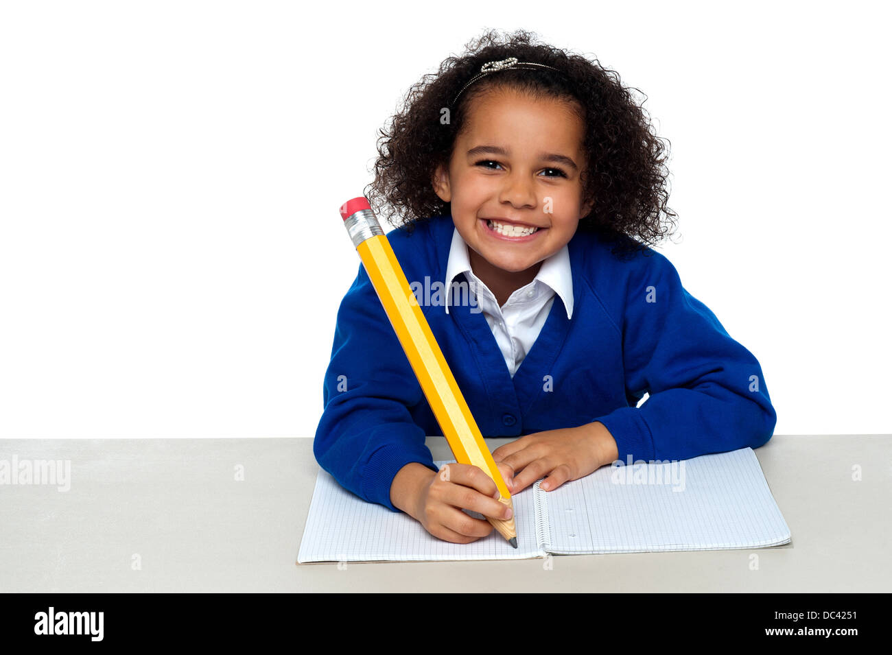 Pretty girl writing in her notebook Stock Photo - Alamy
