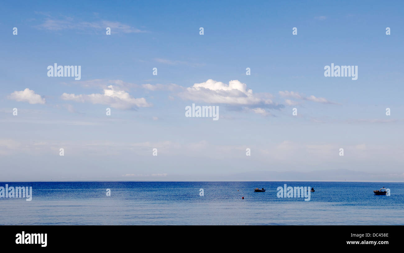 Some boats are in the Aegean sea Stock Photo - Alamy