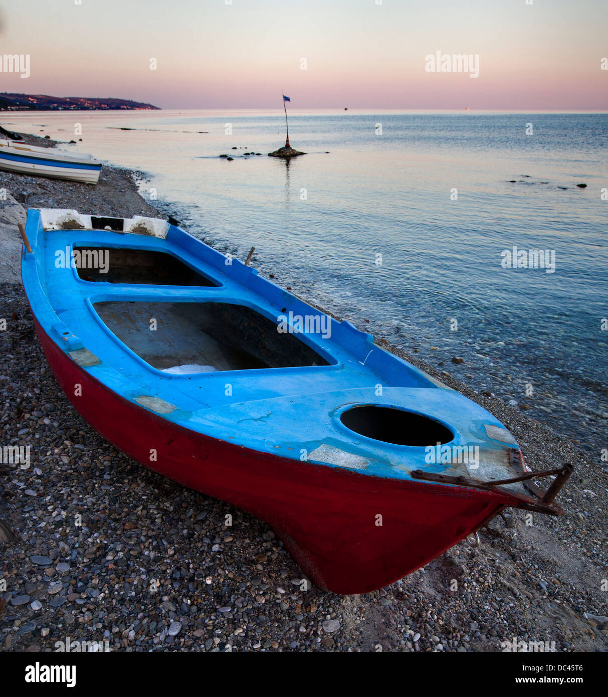 A fishing boat at a seaside Stock Photo - Alamy