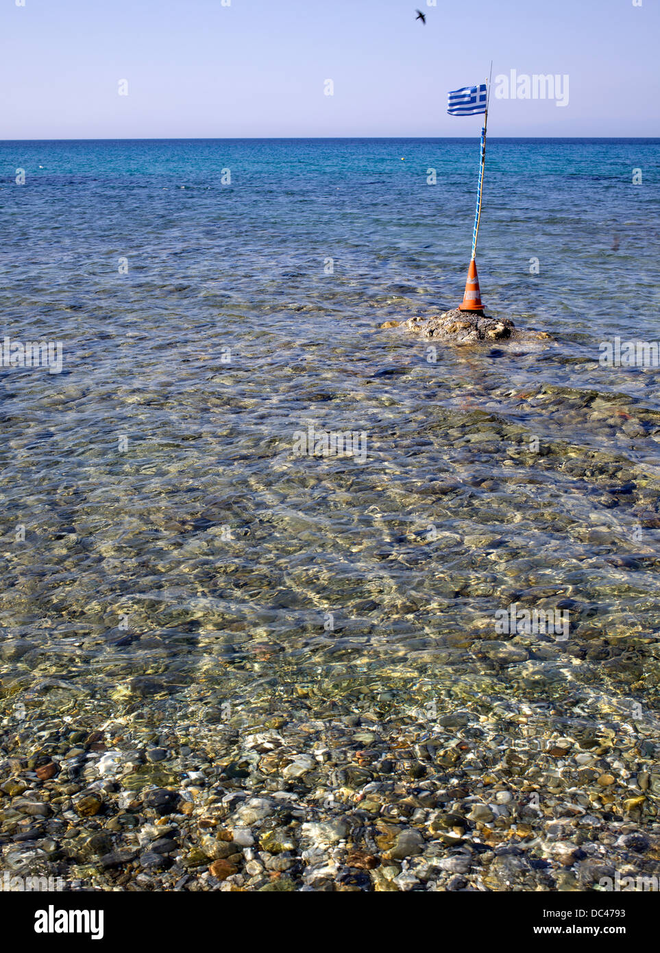 Aegean sea, seagull, boats seen at a beach in Greece Stock Photo - Alamy