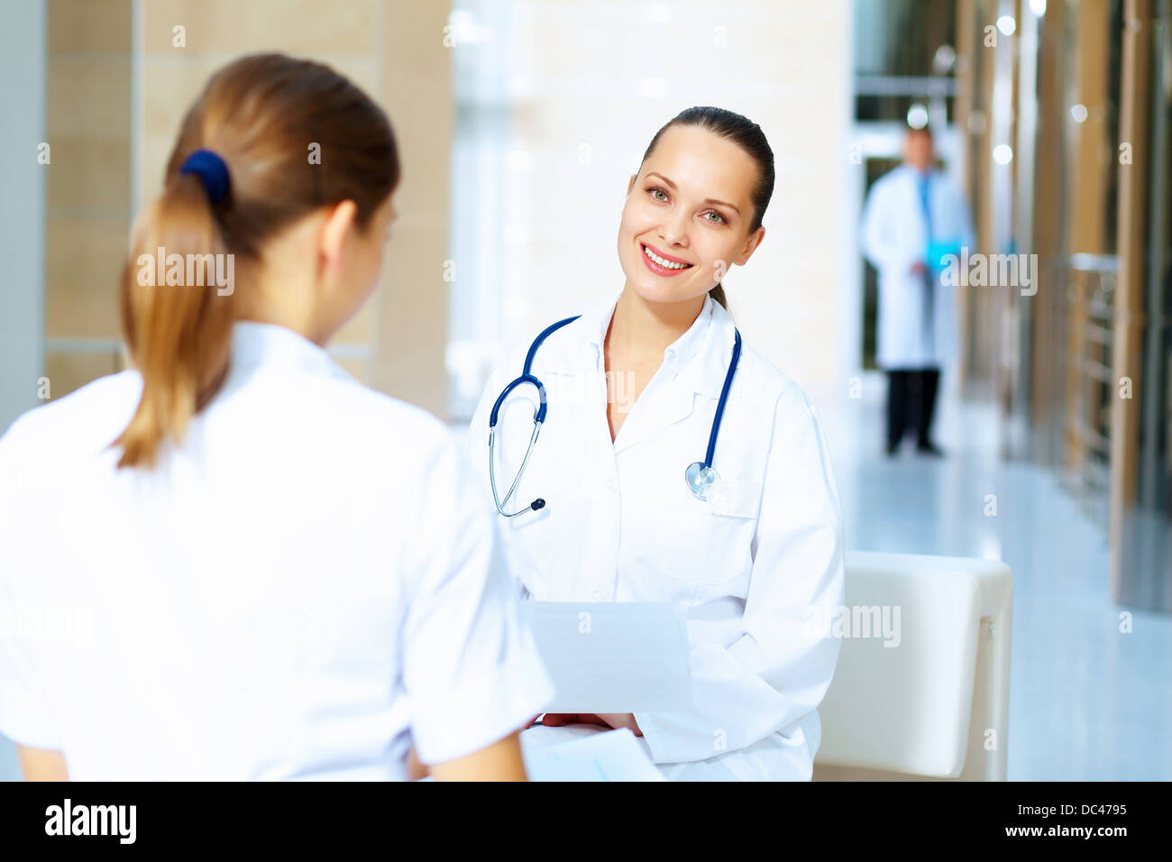 Portrait of two friendly female doctors Stock Photo - Alamy