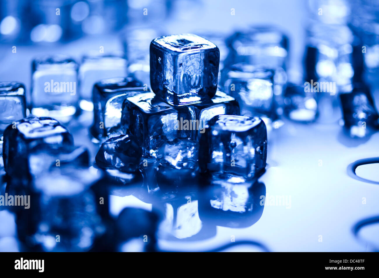 Melting ice cubes Stock Photo - Alamy