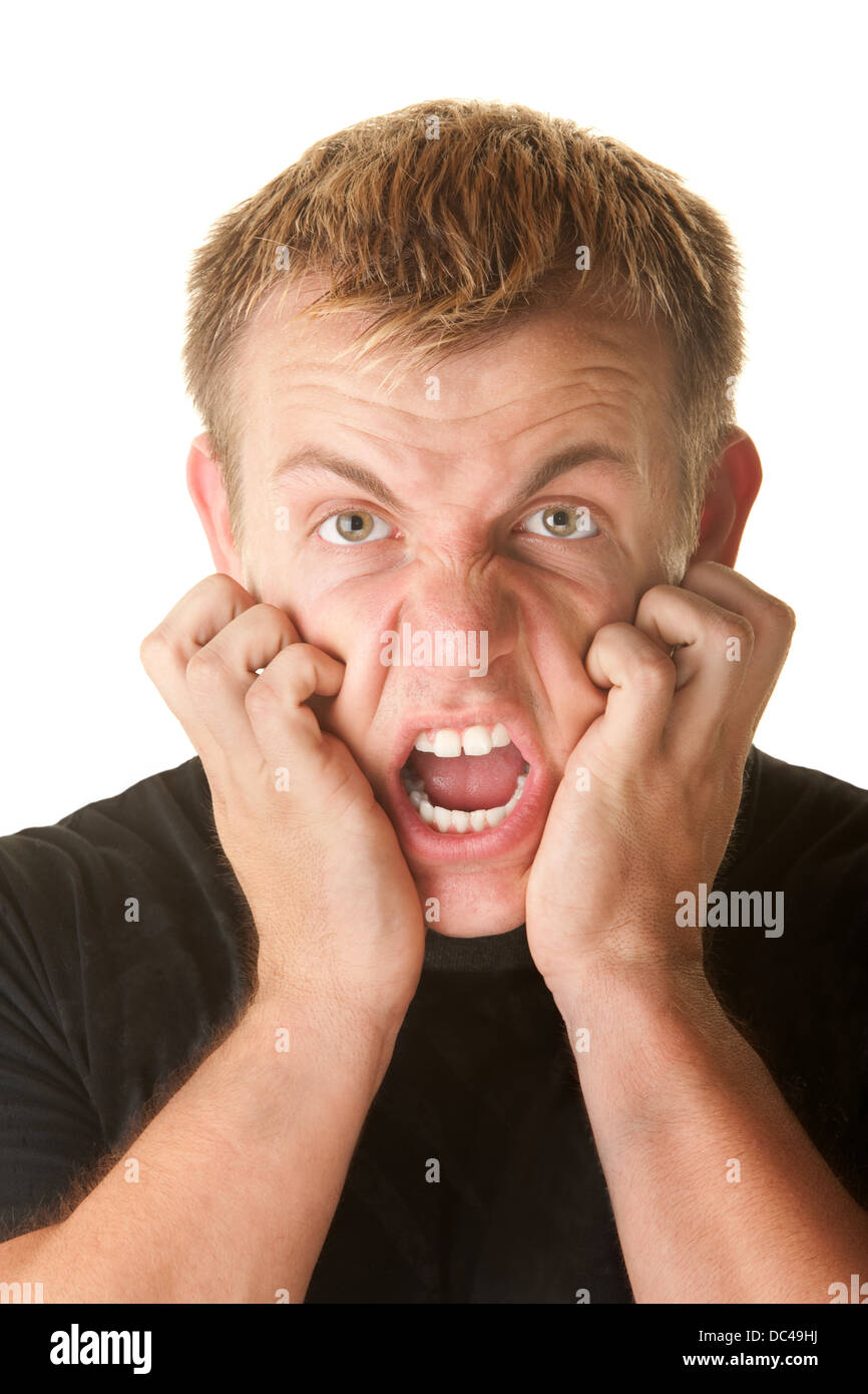 Angry Man Clawing His Face Stock Photo - Alamy