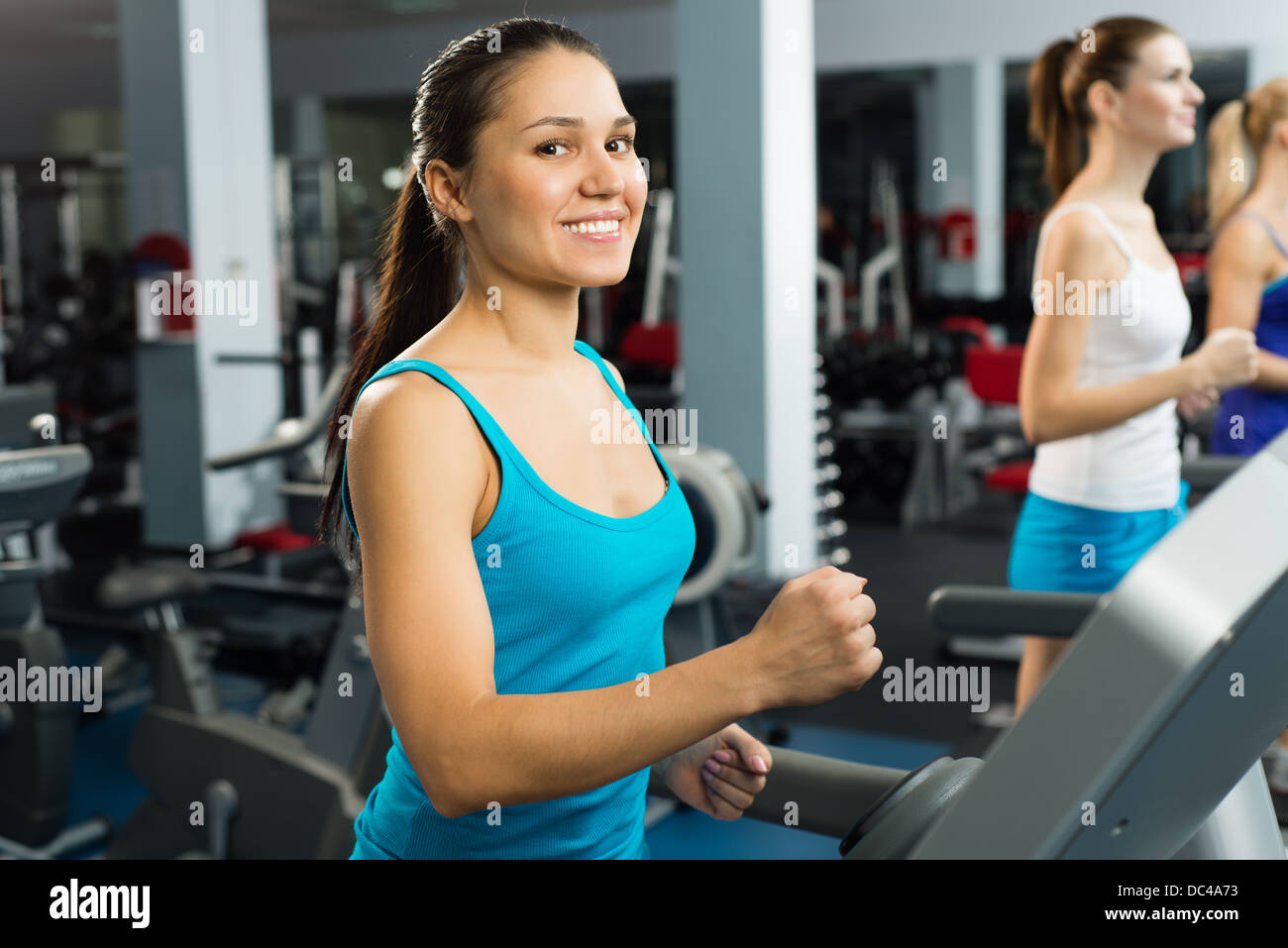 young women running on a treadmill Stock Photo - Alamy