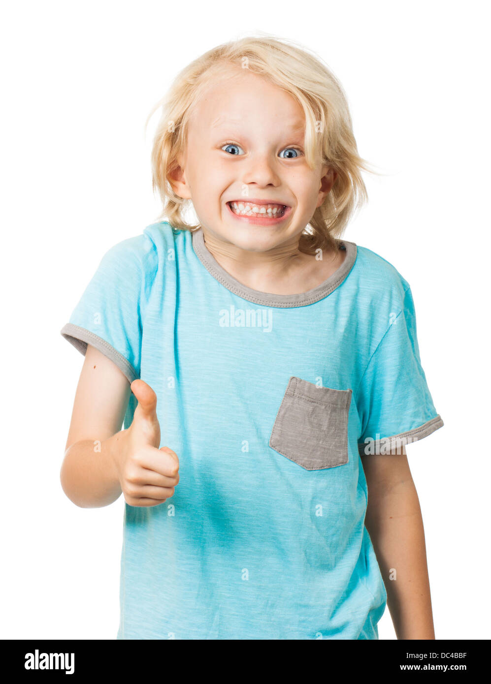 Cute young boy gives thumbs up Stock Photo - Alamy