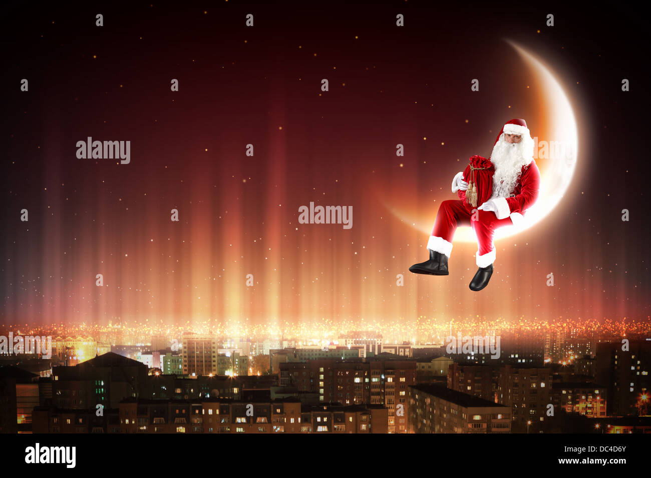 Santa on the moon Stock Photo - Alamy