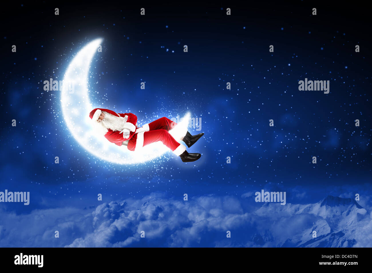 photo of santa claus sitting on the moon Stock Photo - Alamy