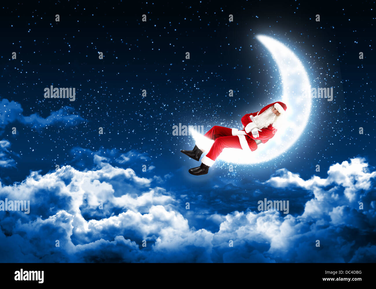 photo of santa claus sitting on the moon Stock Photo - Alamy