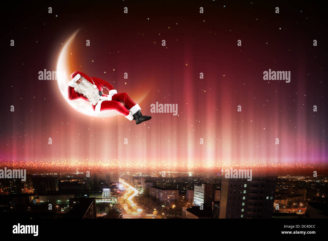 Santa on the moon Stock Photo - Alamy