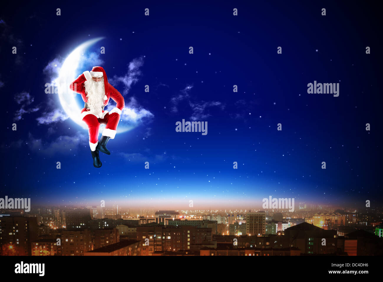 Santa on the moon Stock Photo - Alamy