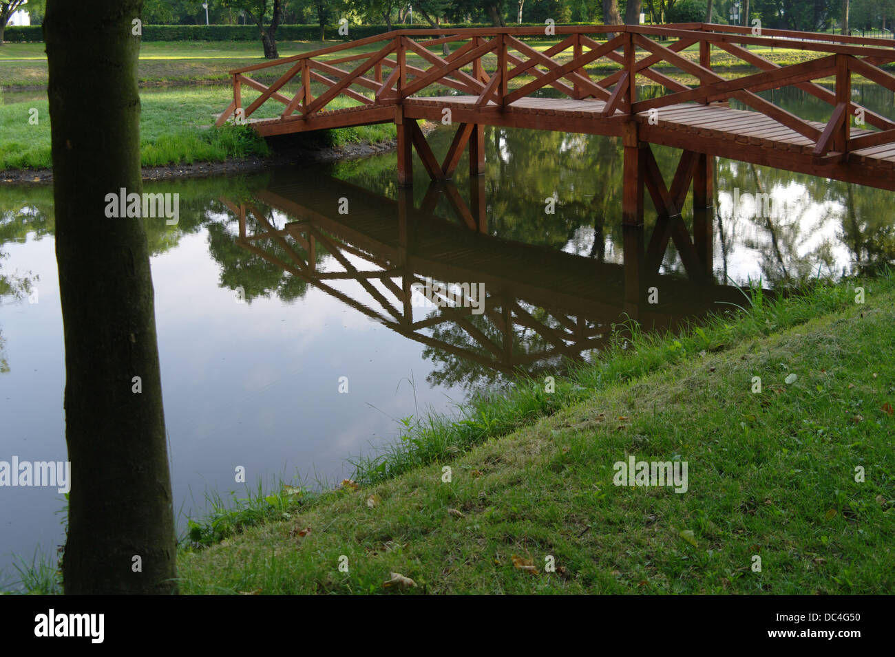 footbridge on a pond Stock Photo - Alamy