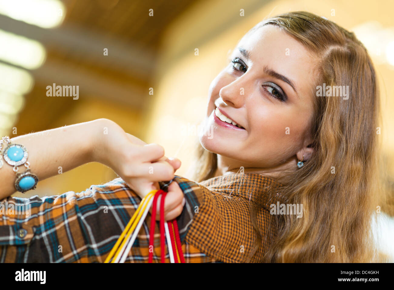 portrait of a beautiful woman in a shopping center Stock Photo - Alamy